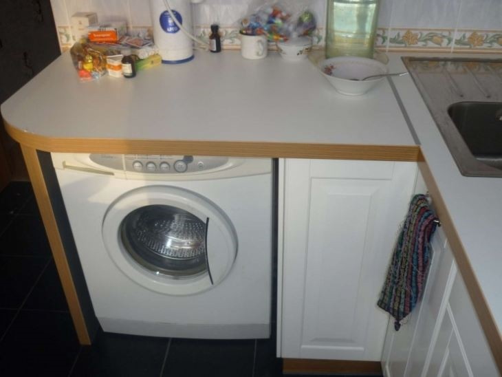 How to hide a washing machine in the kitchen